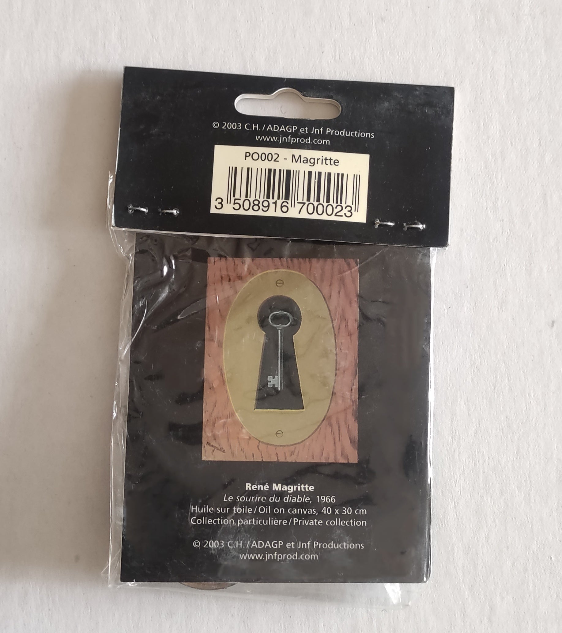 René Magritte (Keychain) – Artistica Fine Art